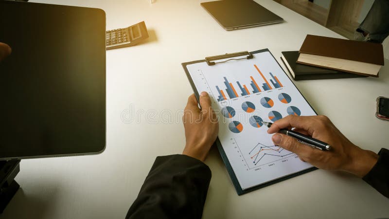 Hand of Business People Pointing on the Graph Stock Image - Image of ...