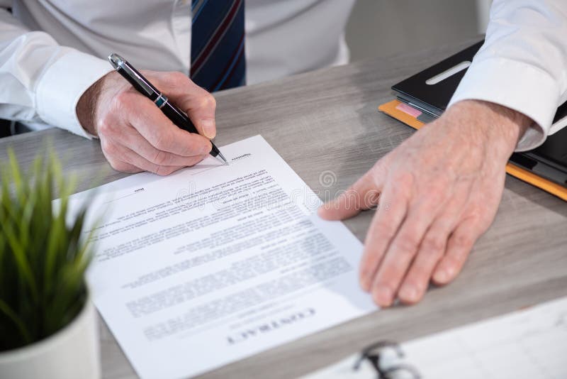 Hand of Businessman Signing a Document Stock Photo - Image of signature ...