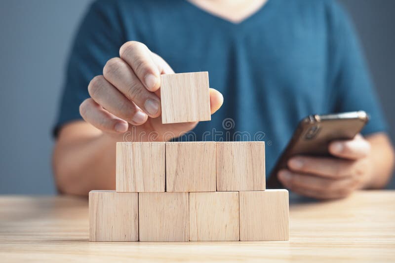 Hand of a Businessman Stacking Wood Empty Eight Blocks with Copy Space ...