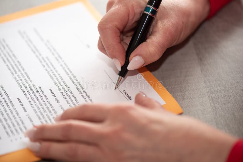 Hand of Businesswoman Signing a Document Stock Image - Image of sitting ...