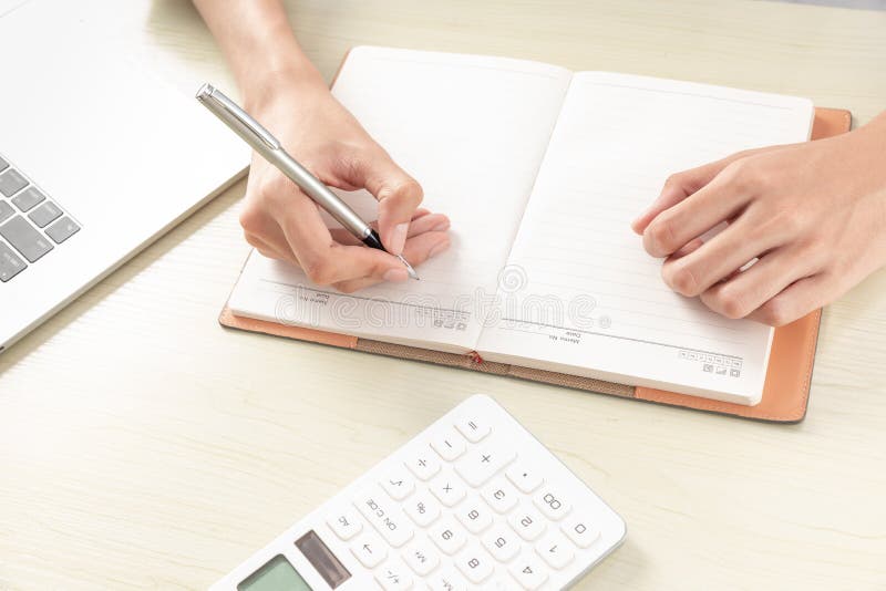 Hand of Businesswoman Writing on Paper in the Office Stock Image ...