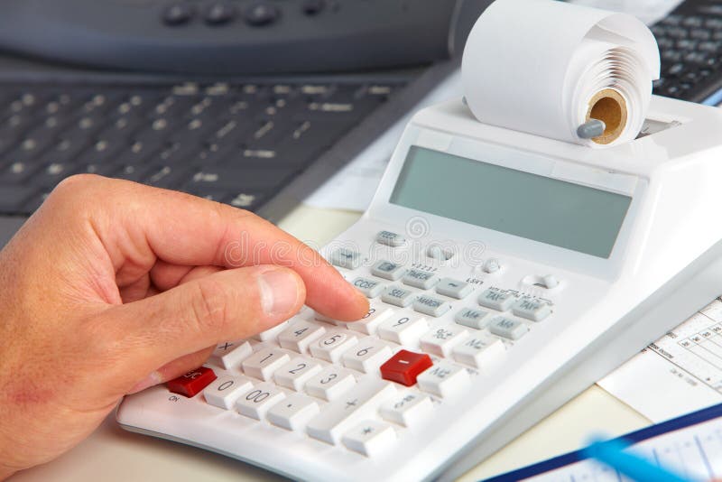 Hand with calculator. stock photo. Image of desk, gain - 89745616