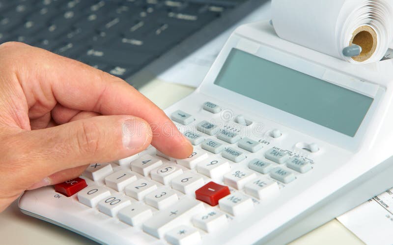 Hand with calculator. stock image. Image of auditing - 89747605