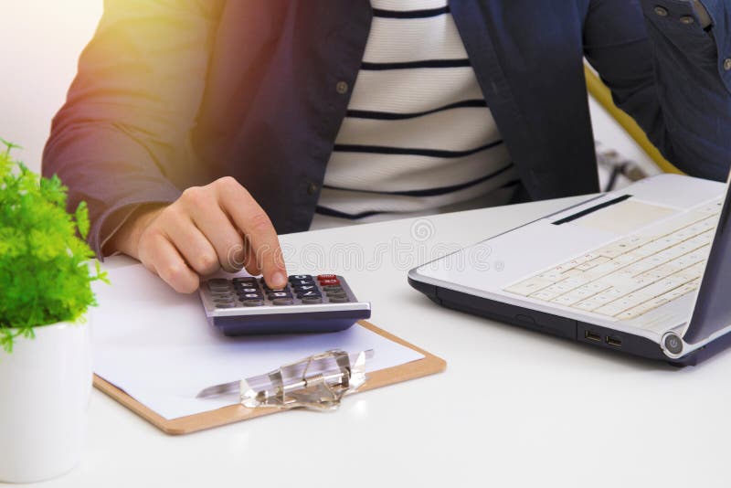 Hand with the calculator stock image. Image of mathematics - 85805091