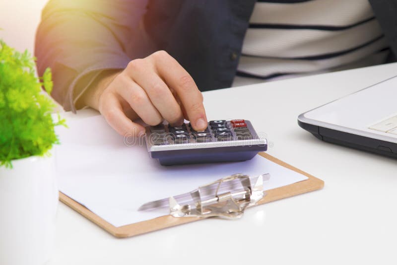 Hand with the calculator stock image. Image of calculate - 85805103