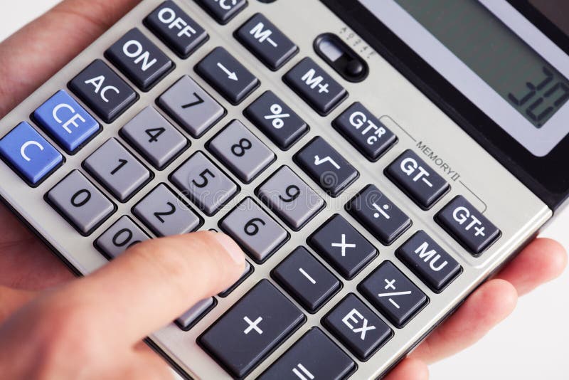 Hand with calculator. stock image. Image of earnings - 89819187