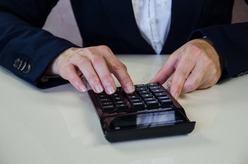 Hand with calculator stock photo. Image of financial - 56909408