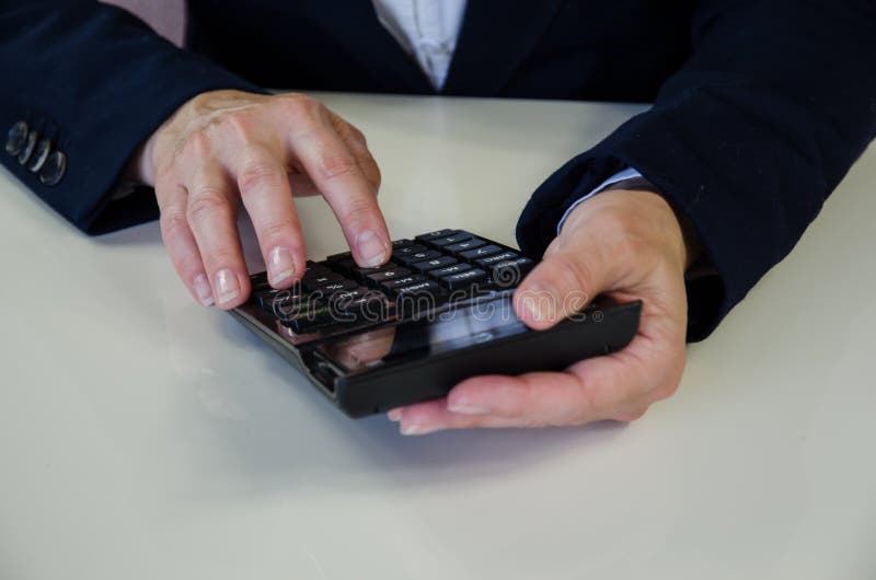 Hand with calculator stock photo. Image of audit, employee - 56909746