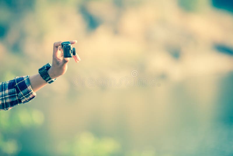 Hand and camera stock photo. Image of person, beautiful - 89071430