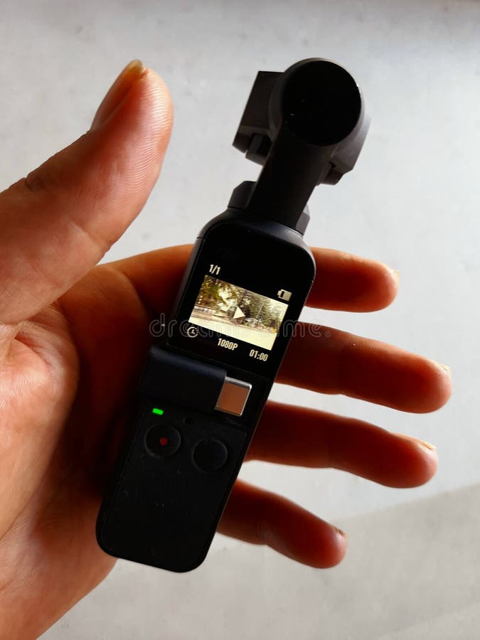 Hand camera image stock image. Image of minicamera, hand - 200646937