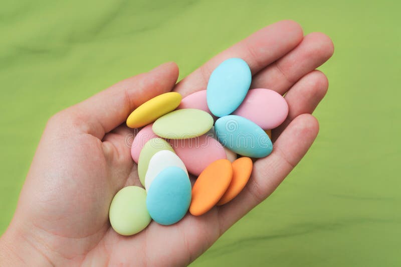 Hand with candies stock image. Image of pill, candies - 19860061