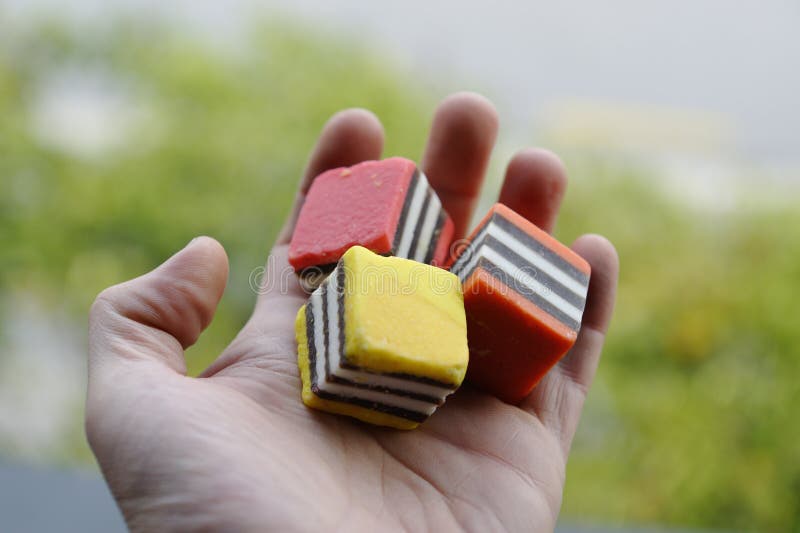 Hand with candy stock photo. Image of energy, yellow - 75024652