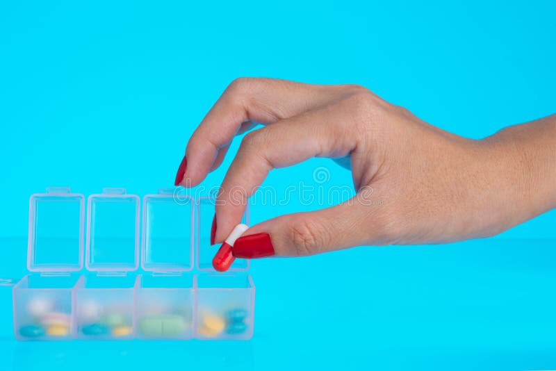 Hand with capsule stock image. Image of supplement, pills - 52580675