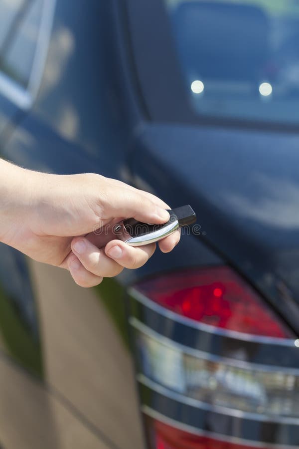 Hand With A Car Alarm Remote Control Stock Image - Image of business ...