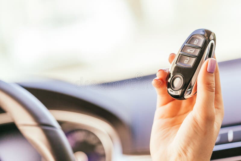 Hand with car key stock photo. Image of button, alarm - 70986580