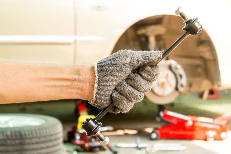 Hand with Car Stabilizer Control Link, Close Up. Stock Photo - Image of ...