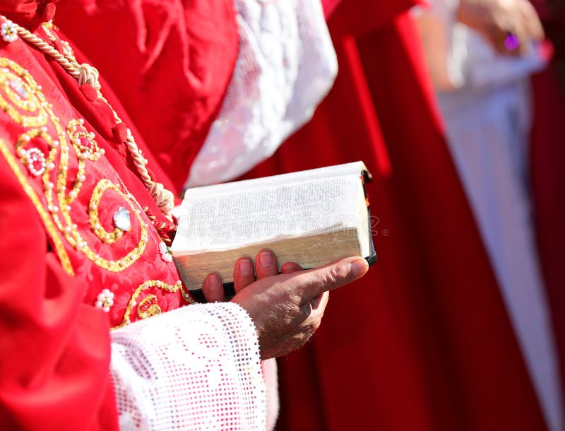 Hand of the Cardinal Reading the Book of the Bible with the Sacred ...