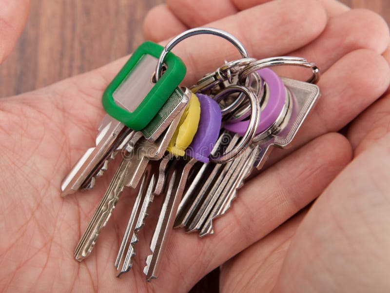 Hand Carrying Bunch of Keys Stock Photo - Image of item, real: 46361592
