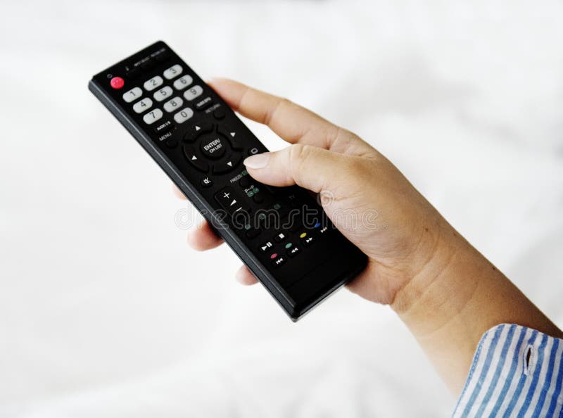 Hand Carrying a Remote Controller Stock Image - Image of apartment ...