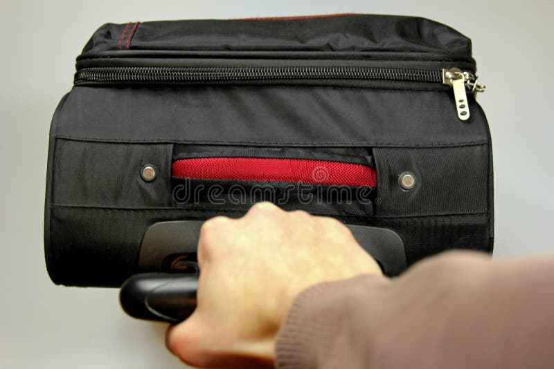 Hand carrying suitcase stock photo. Image of departure - 29521846