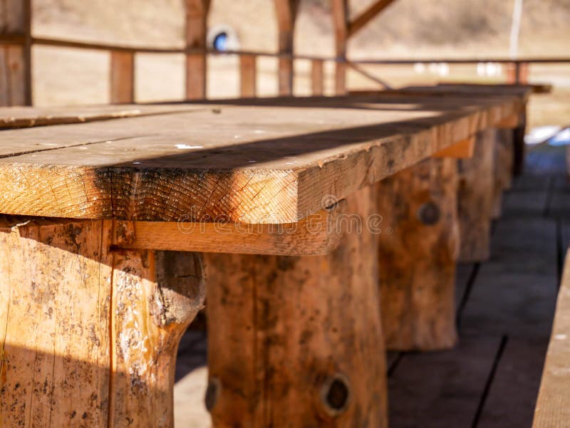 Hand Carved Pine Wood Table Top on Rough Pine Logs Stock Photo - Image ...