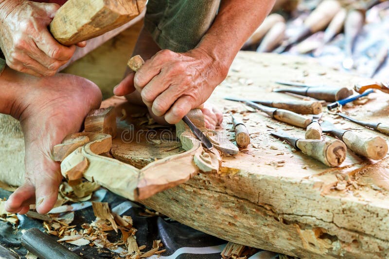Hand of Carver Carving Wood Stock Image - Image of decoration, hammer ...