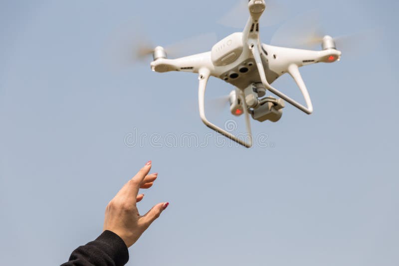Hand catch drone stock photo. Image of attractive, helicopter - 88869426