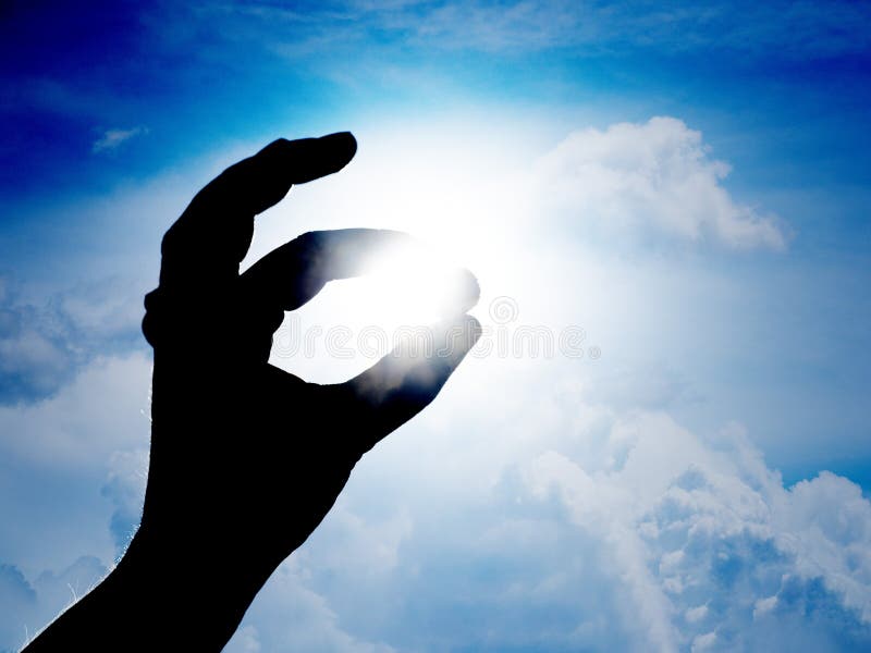 Hand catching the sun stock image. Image of sunset, sunshine - 214408405