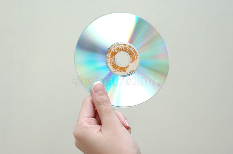 Man S Hand Holding DVD CD Disc Stock Photo - Image of information ...