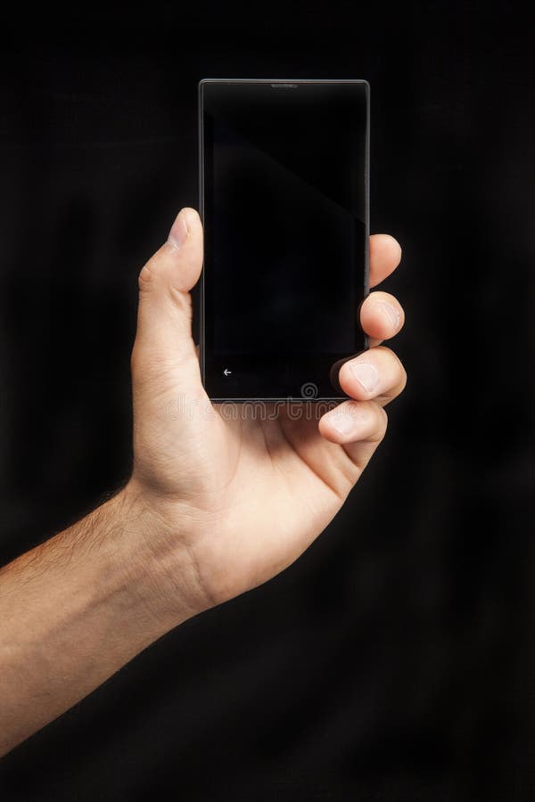 Hand with cellphone stock image. Image of electronic - 56122229