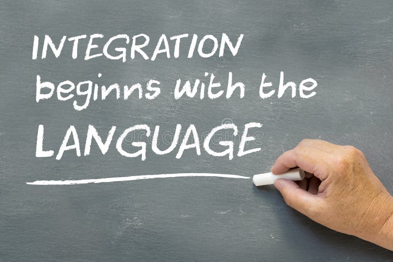Hand on a Chalkboard with the Message Integration Begins with Th Stock ...