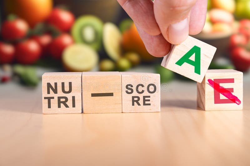 Hand Changing the Expression Nutri-score E To Nutri-score a. Stock ...