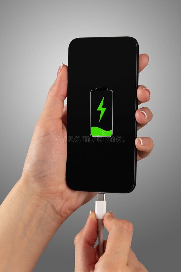 Hand charging phone stock image. Image of cellphone - 159548555