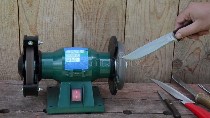 Hand check knife sharp stock video. Video of grinder - 35838328