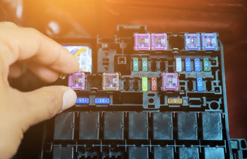 Hand Checking Electric Fuses Wire Cable of Car Engine Stock Image ...