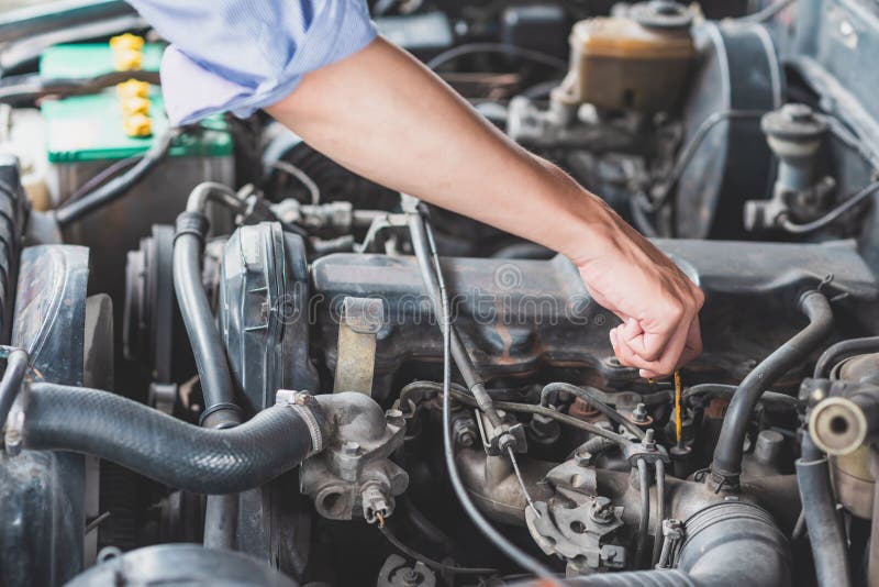 Hand Checking Oil Gauge Level Stock Image - Image of holding, checking ...