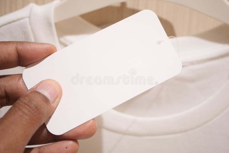 Hand Checking Price Tag on Cloth Stock Image - Image of empty, check ...