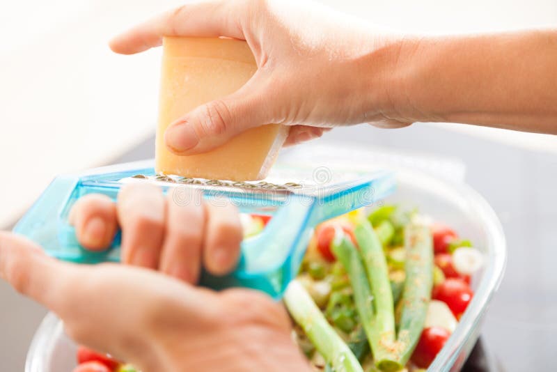 Grater and cheese stock image. Image of portion, cheese - 16555899