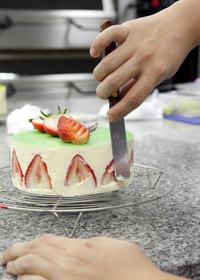 Hand of Chef Decorating Cake Stock Photo - Image of chefs, cake: 35233320