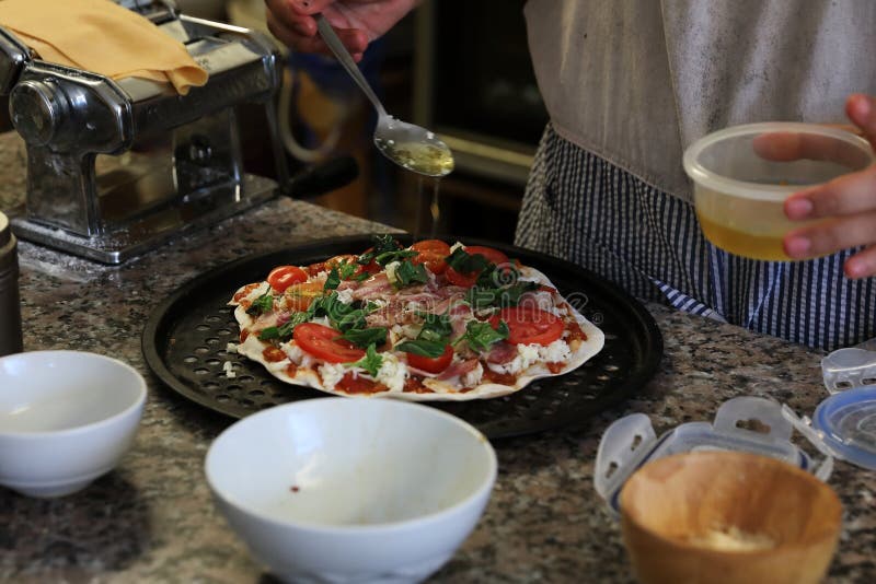 Hand of Chef Making Pizza at Homemade Kitchen Stock Image - Image of ...