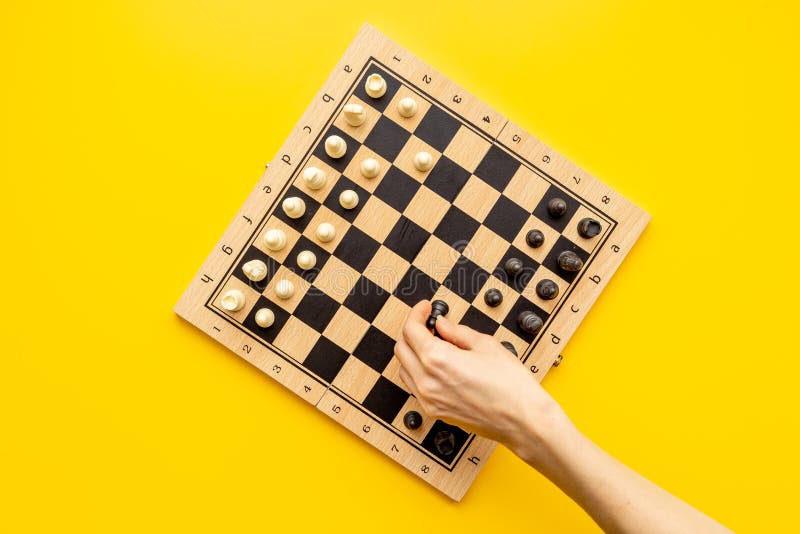Hand with Chess Pieces - Battle on Chessboard. Competition Business ...