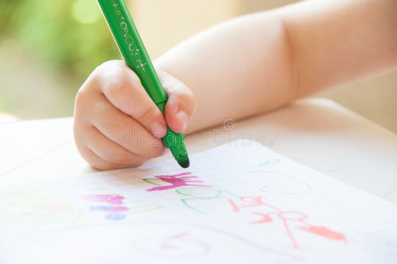 Hand of child drawing stock photo. Image of white, education - 109980480