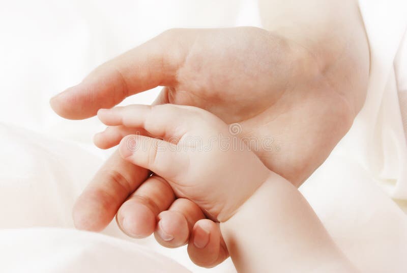 Hand of the Child in a Hand of Mother Stock Image - Image of body, bare ...