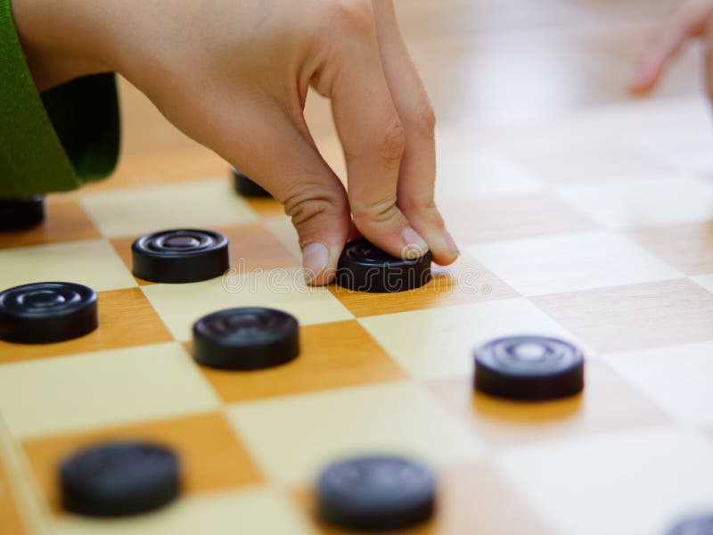 Hand Child Playing Checkers at the Table Stock Photo - Image of leisure ...