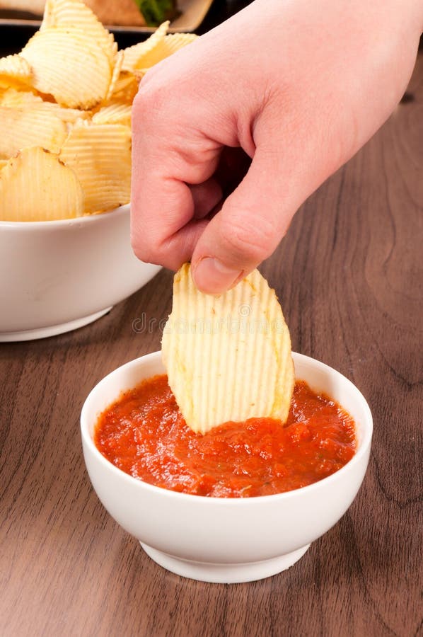 Hand and chips stock image. Image of food, delicious - 29562057