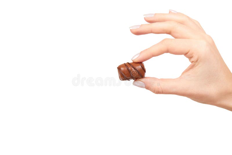 Hand with Chocolate Candy, Sweet Dessert Closeup Stock Image - Image of ...