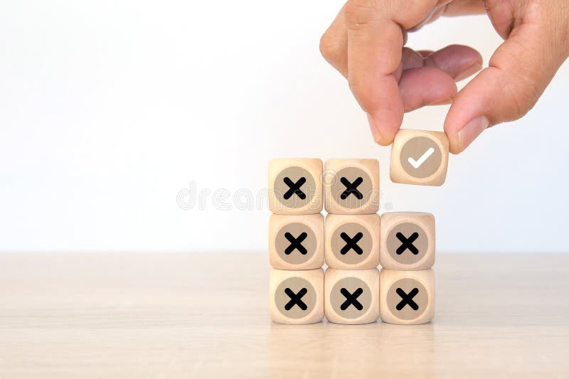 Hand Choose Check Mark with Cross Symbol on Cube Wooden Block Stack for ...