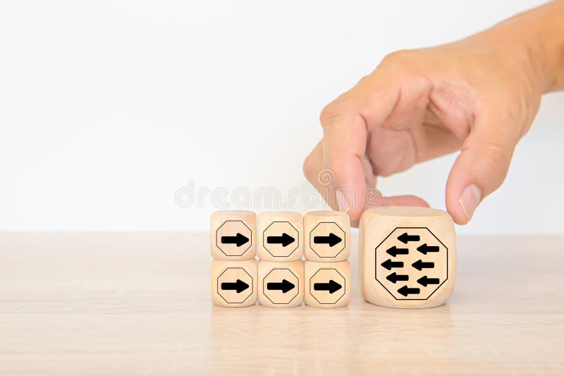 Hand Chooses Arrow Icon Point To the Opposite Side on Cube Wooden Block ...