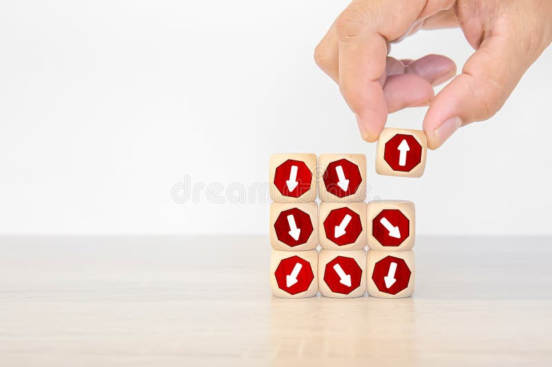 Hand Chooses Arrow Icon Point To the Opposite Side on Cube Wooden Block ...