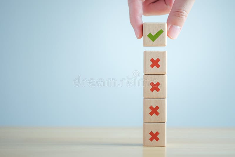 Hand Choosing Green Correct Check Mark among Many Red Wrong or Cross ...